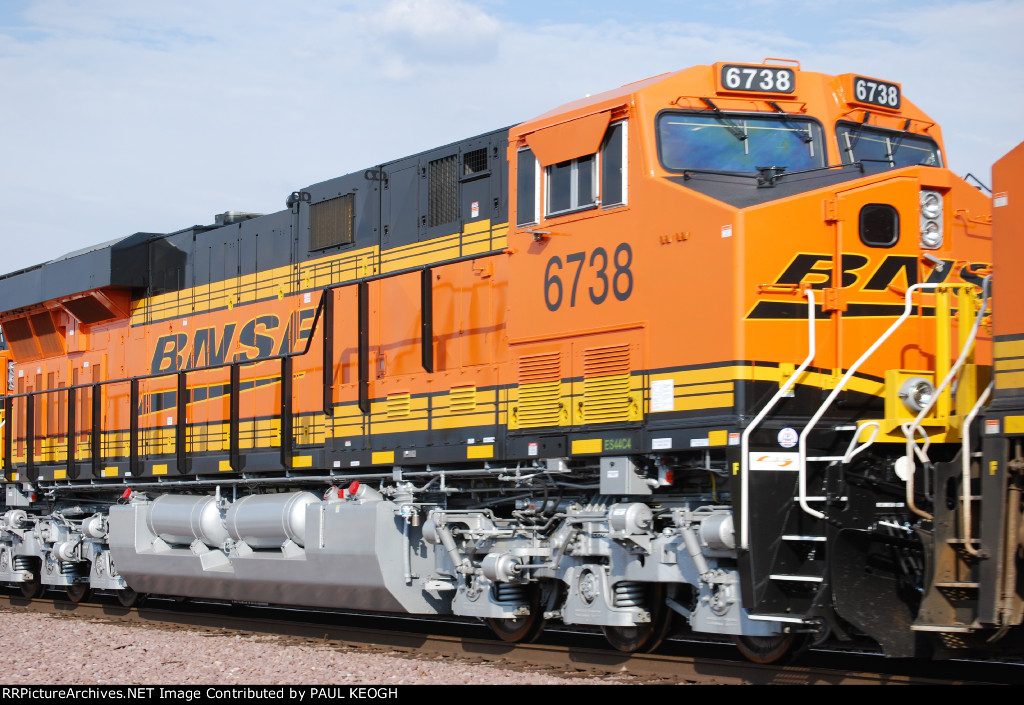 BNSF 6738 a 3rd Unit behind the leader C4 BNSF 6736 heads westbound towards the Cajon Pass and ...